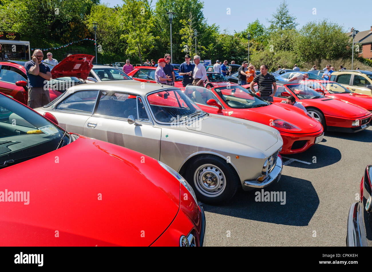 Collection of classic and modern Italian cars on display Stock Photo ...