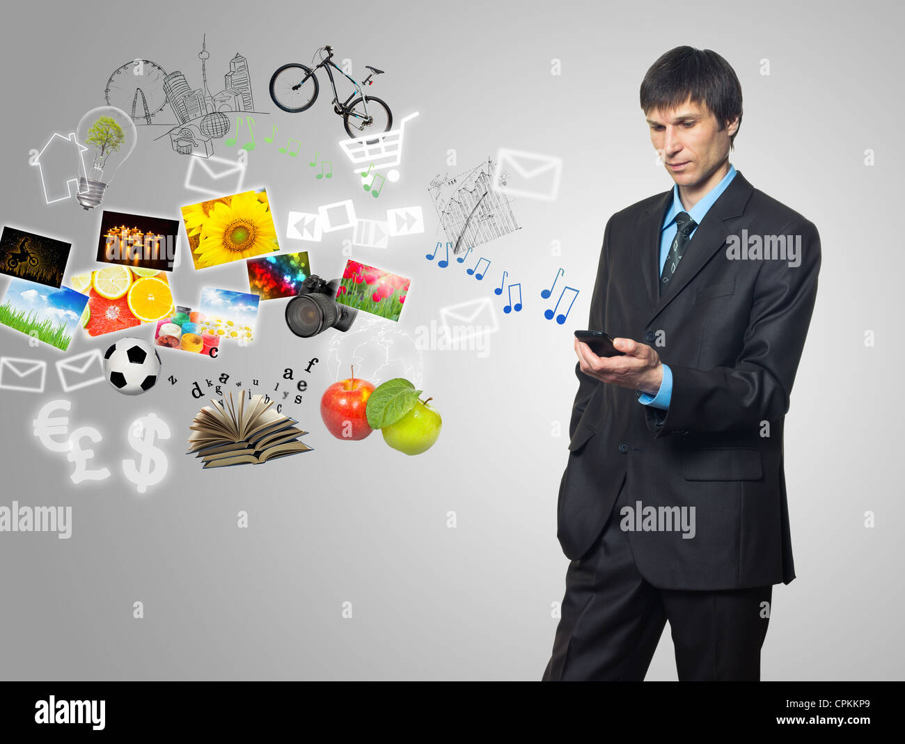 Businessman using mobile phone with touch screen with streaming images ...