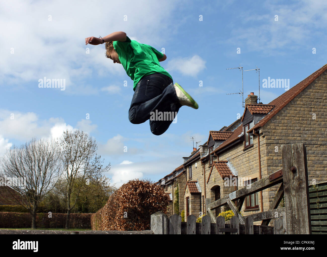 Jumping Over The Fence Stock Photos & Jumping Over The Fence Stock ...