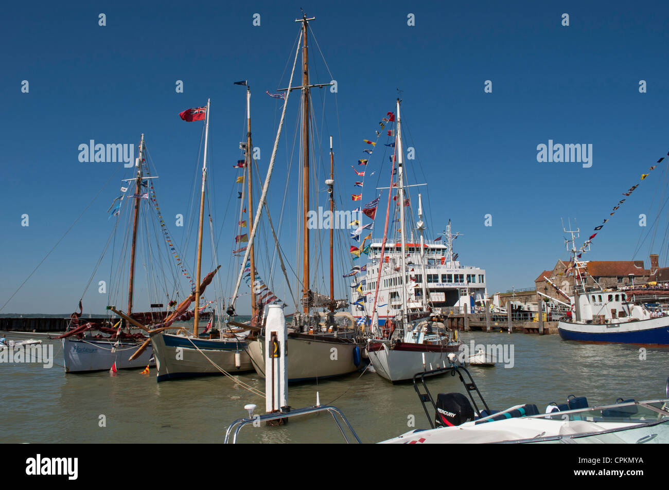 Yarmouth Harbour with moored boats and the Isle of Wight Ferry behind ...