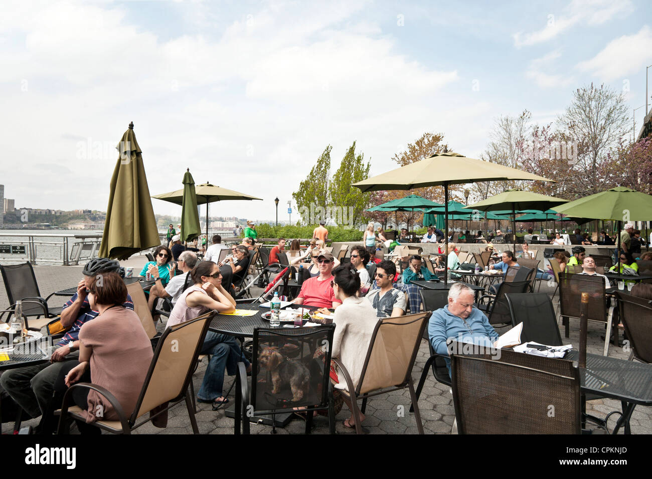 people enjoy warm spring weather eating outside on opening day of ...