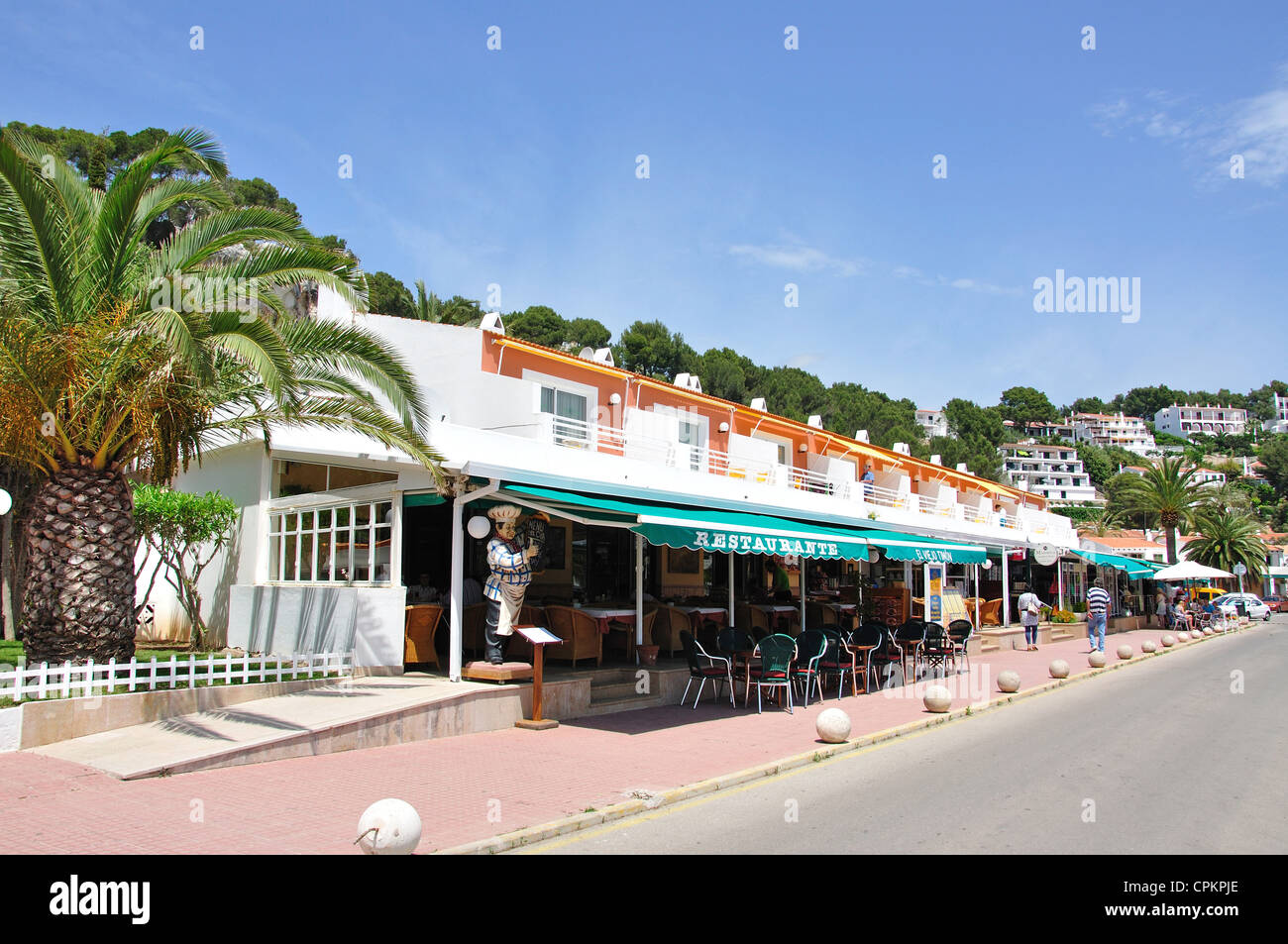Shops and restaurants on Passeig del Riu, Cala Santa Galdana, Menorca ...