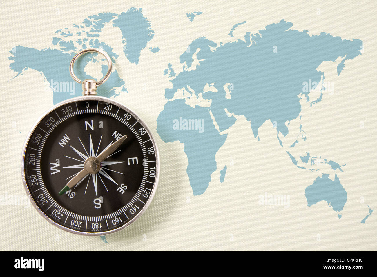 black compass on blue world map. concept for travel and tourism Stock ...