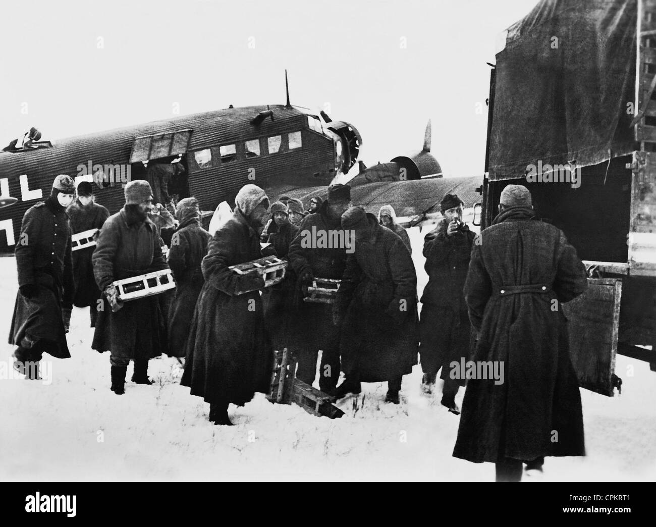Unloading a German transport aircraft on the Eastern front, 1943 Stock ...