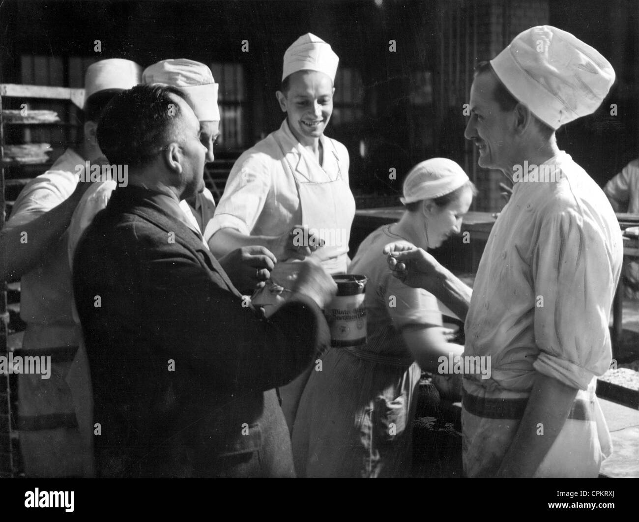 Donations collecting Black and White Stock Photos & Images - Alamy