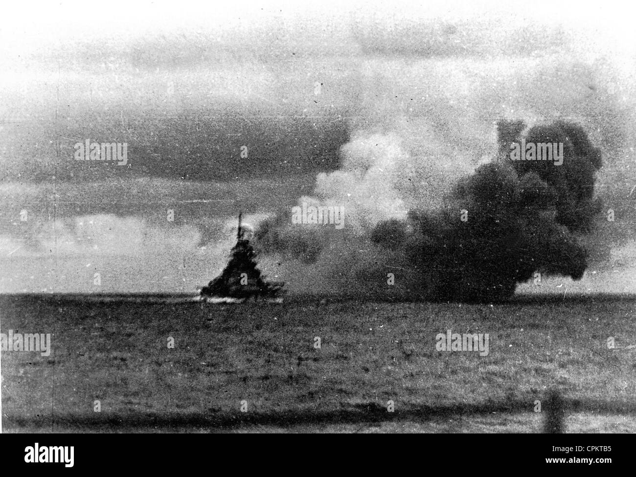 View of the German battleship 'Bismarck' firing on British naval forces ...