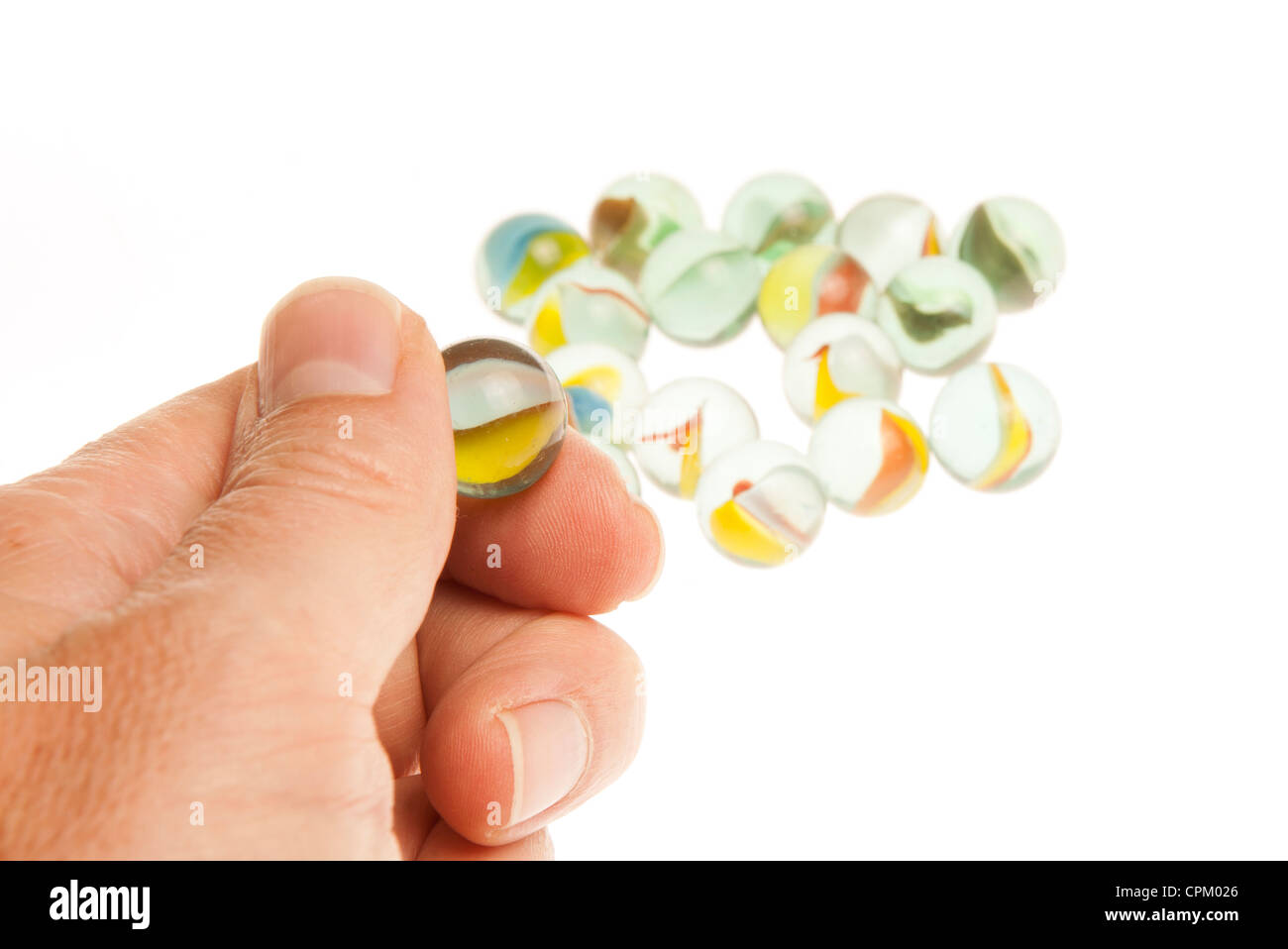 hand picking up a marble Stock Photo - Alamy