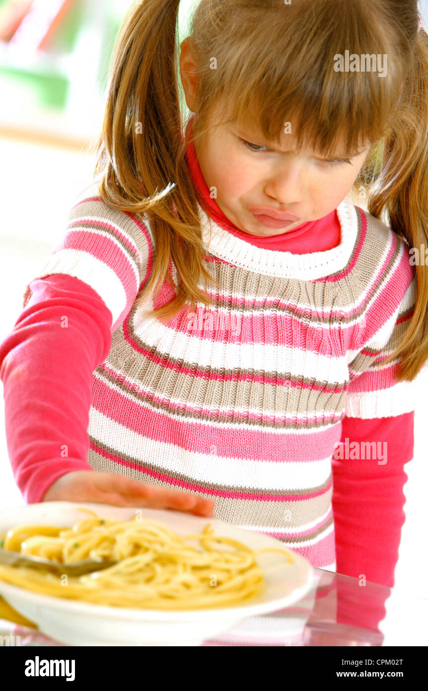 CHILD EATING STARCHY FOOD Stock Photo - Alamy