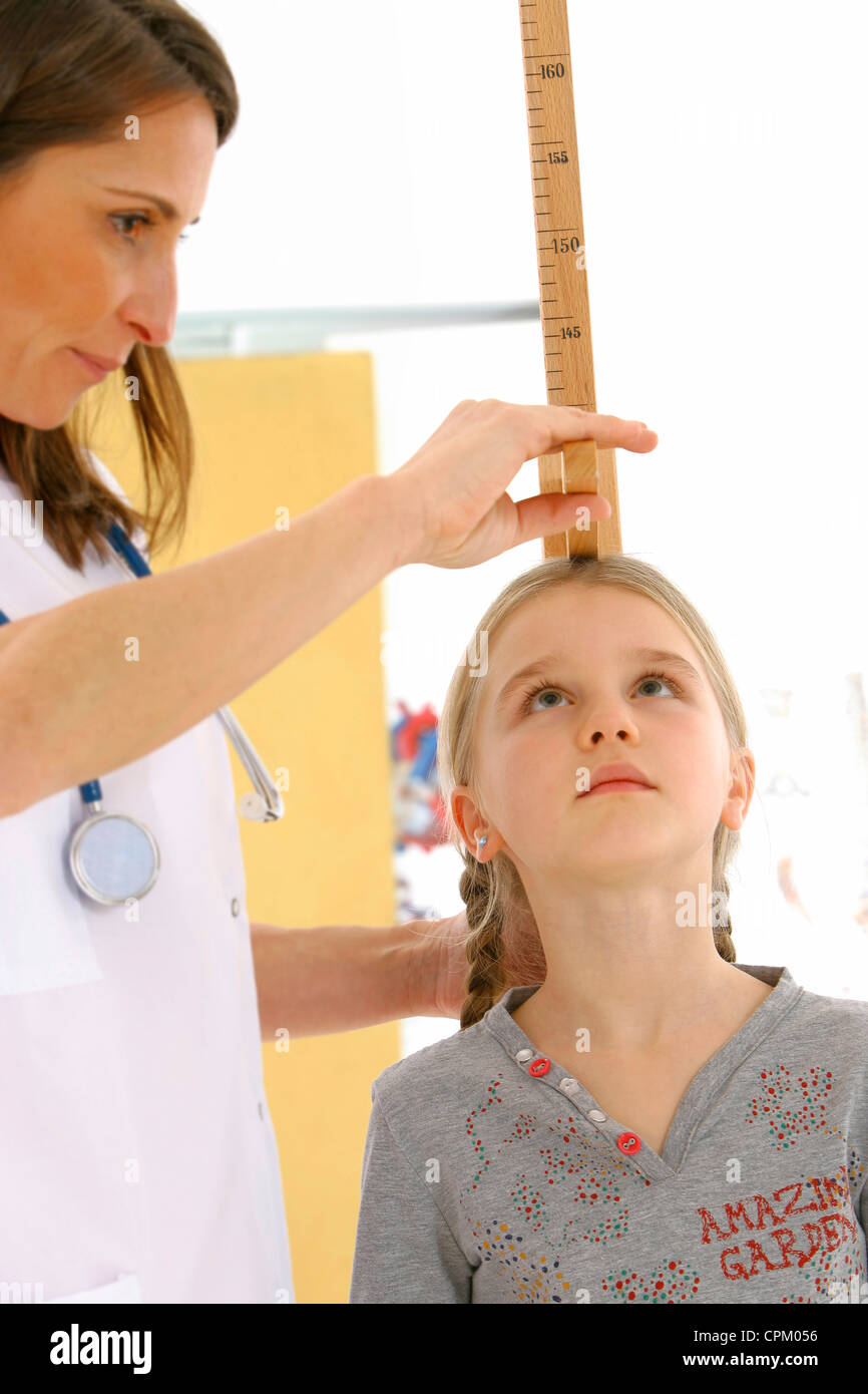MEASURING HEIGHT IN A CHILD Stock Photo - Alamy
