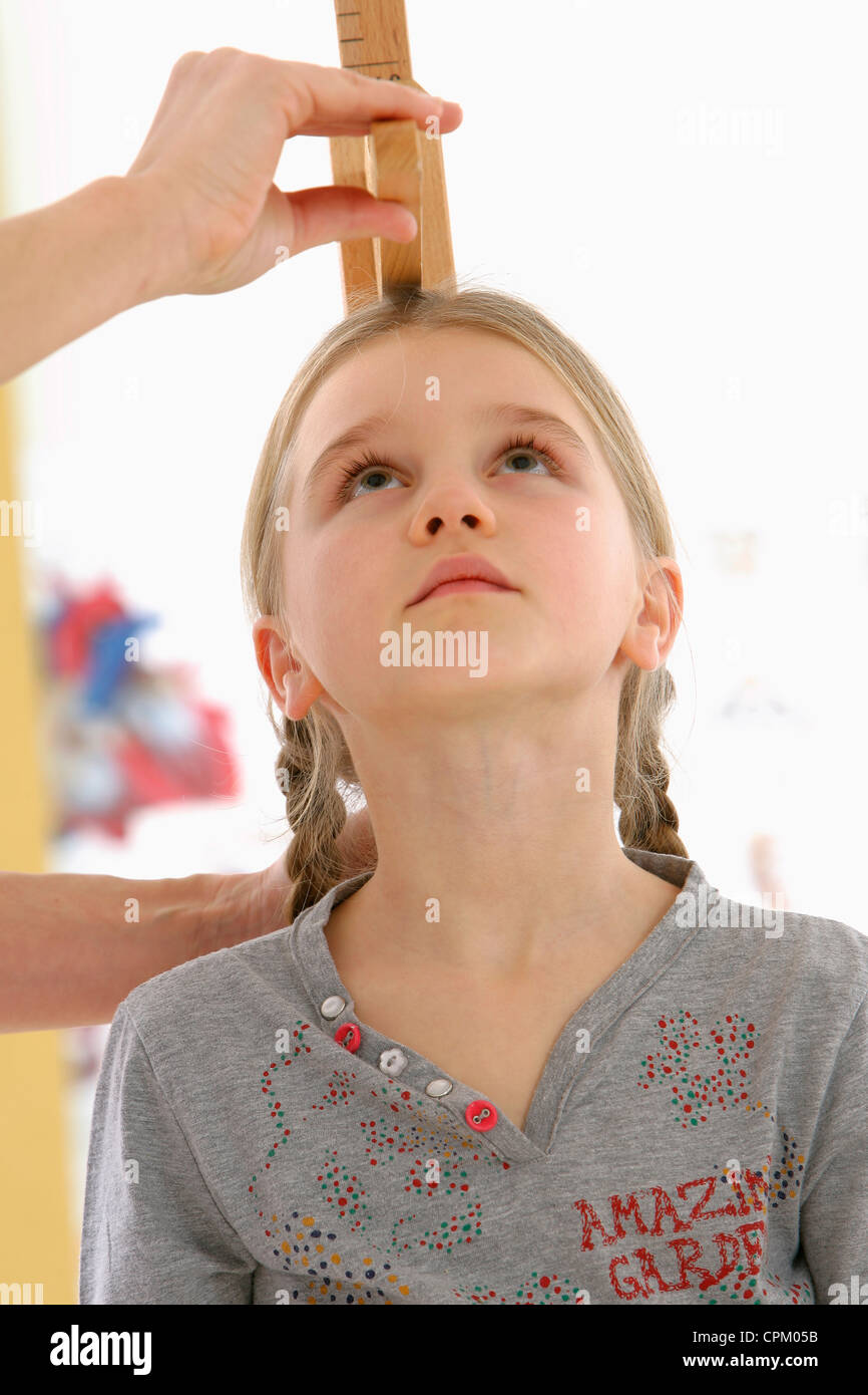 MEASURING HEIGHT IN A CHILD Stock Photo - Alamy