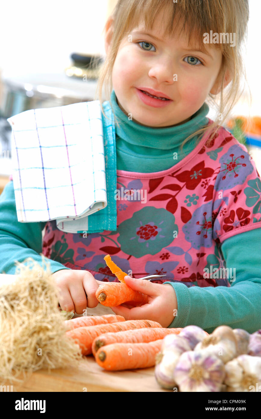 CHILD IN KITCHEN Stock Photo - Alamy