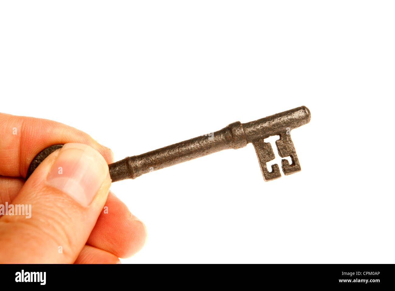 holding a big old key Stock Photo - Alamy