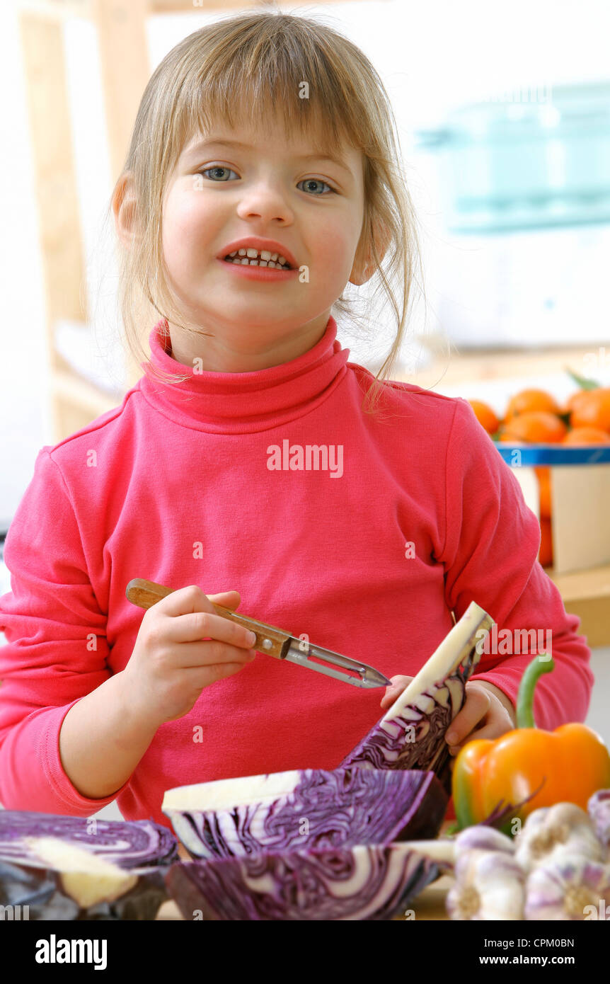 CHILD IN KITCHEN Stock Photo - Alamy