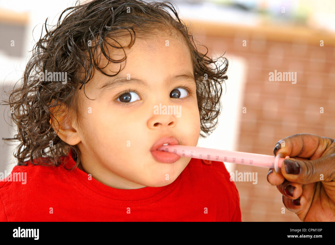 Baby medication syringe hi-res stock photography and images - Alamy