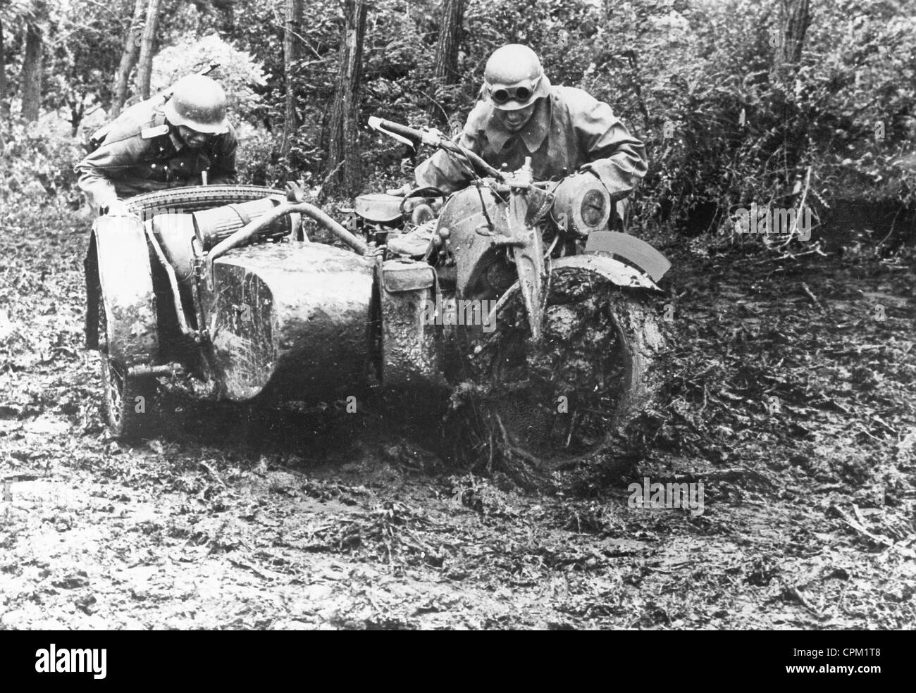 Soldiers with their motorcycle on the Eastern Front, 1941 Stock Photo ...