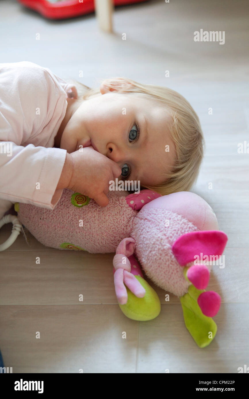 Child stretched out lying floor hi-res stock photography and images - Alamy