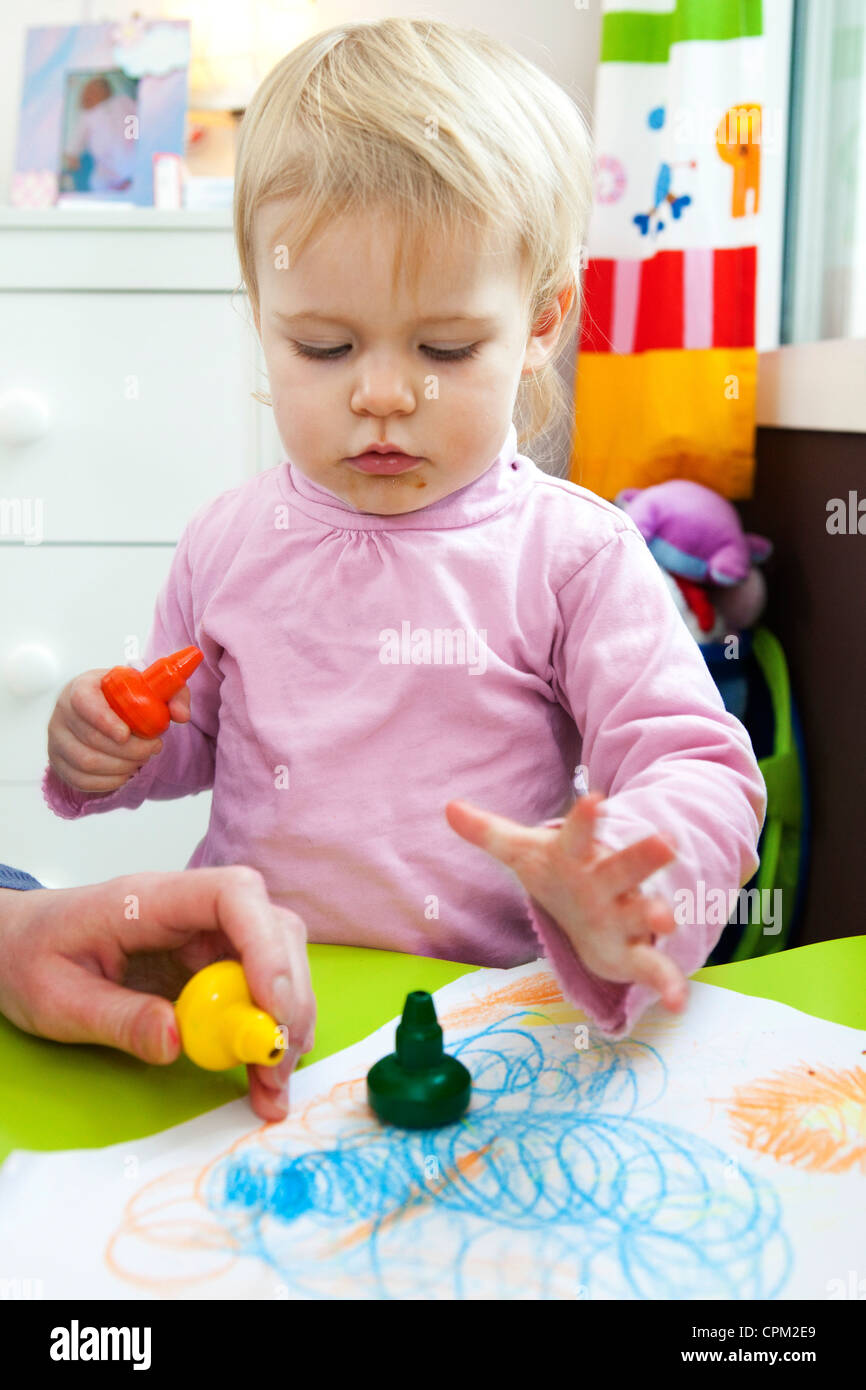 CHILD DRAWING INDOORS Stock Photo - Alamy