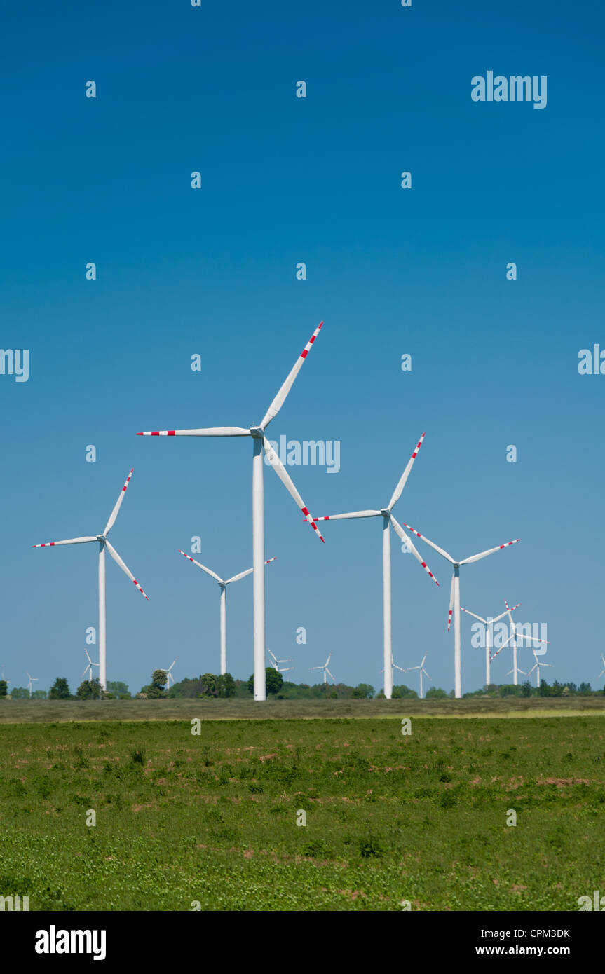 Wind turbine farm on rural terrain Stock Photo - Alamy
