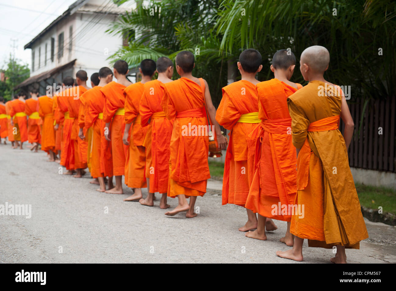 Gathering alms hi-res stock photography and images - Alamy