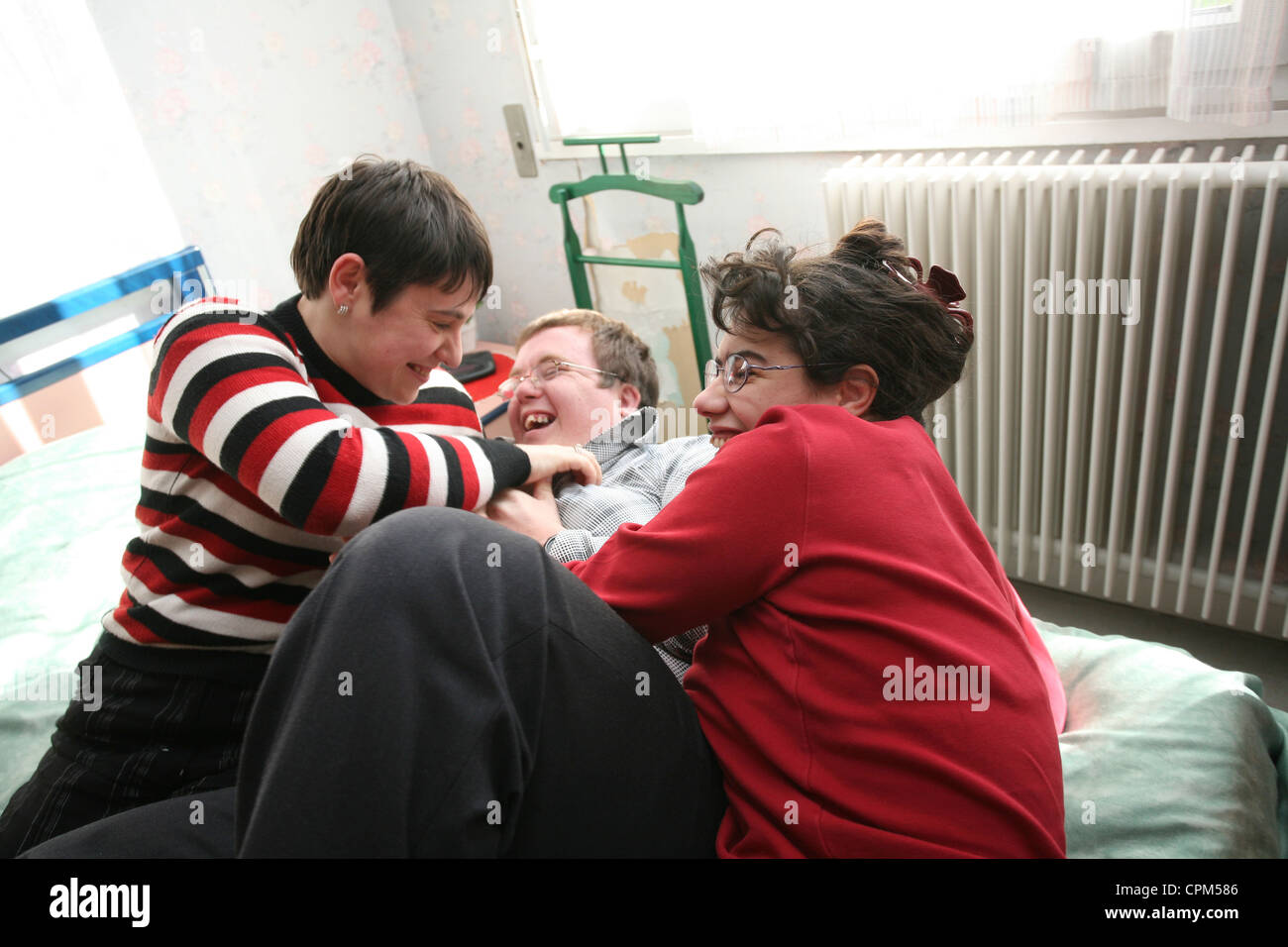 Tickle giggle giggling hi-res stock photography and images - Alamy