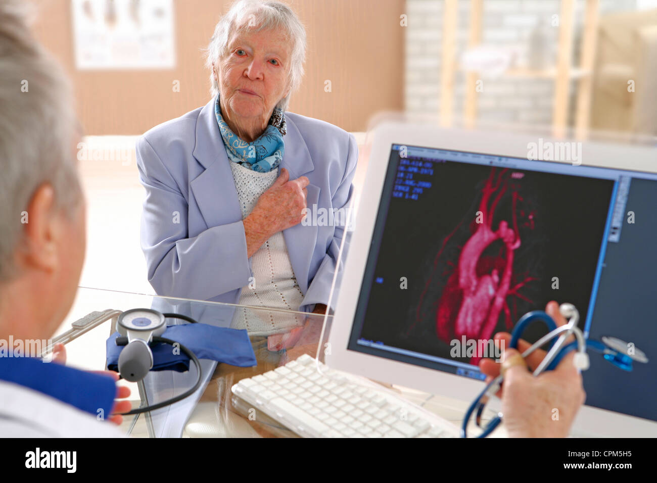 CARDIOLOGY CONSULT. ELDERLY PERS Stock Photo - Alamy