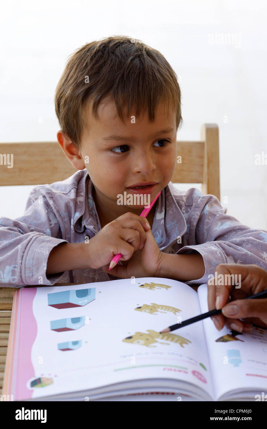 CHILD DOING HOMEWORK Stock Photo - Alamy