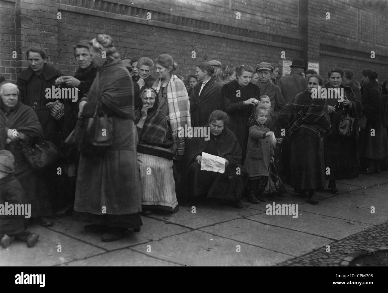 Waiting in line in Germany during WWI, 1916 Stock Photo - Alamy