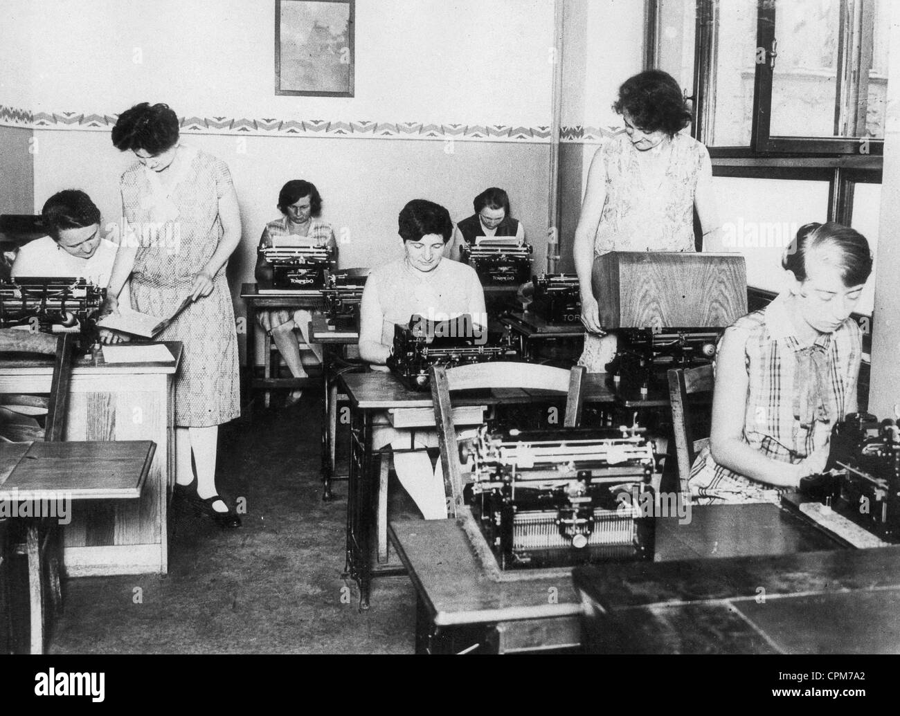 Typists in a typing pool, 1929 Stock Photo - Alamy