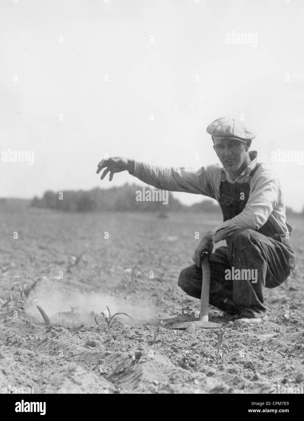 Farmer during the drought in his field in the corn belt of the United ...