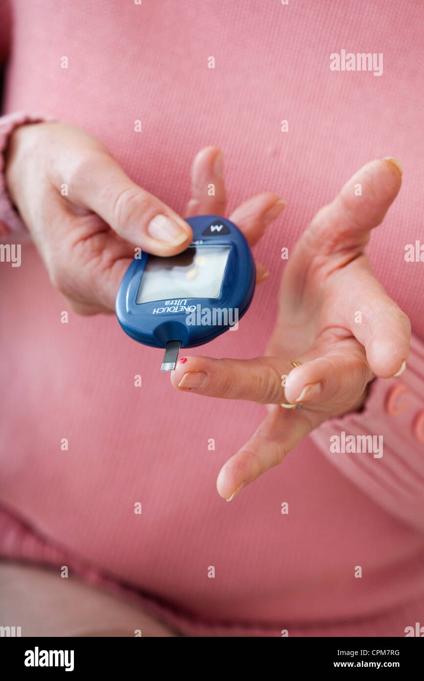 TEST FOR DIABETES ELDERLY PERSON Stock Photo - Alamy