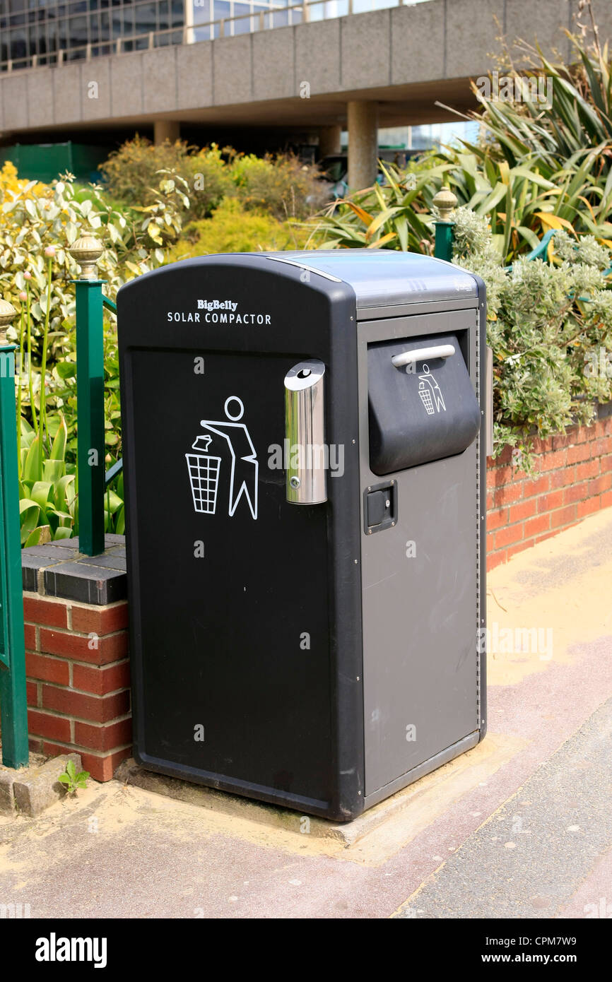 A public waste bin with a built-in solar compactor Stock Photo - Alamy