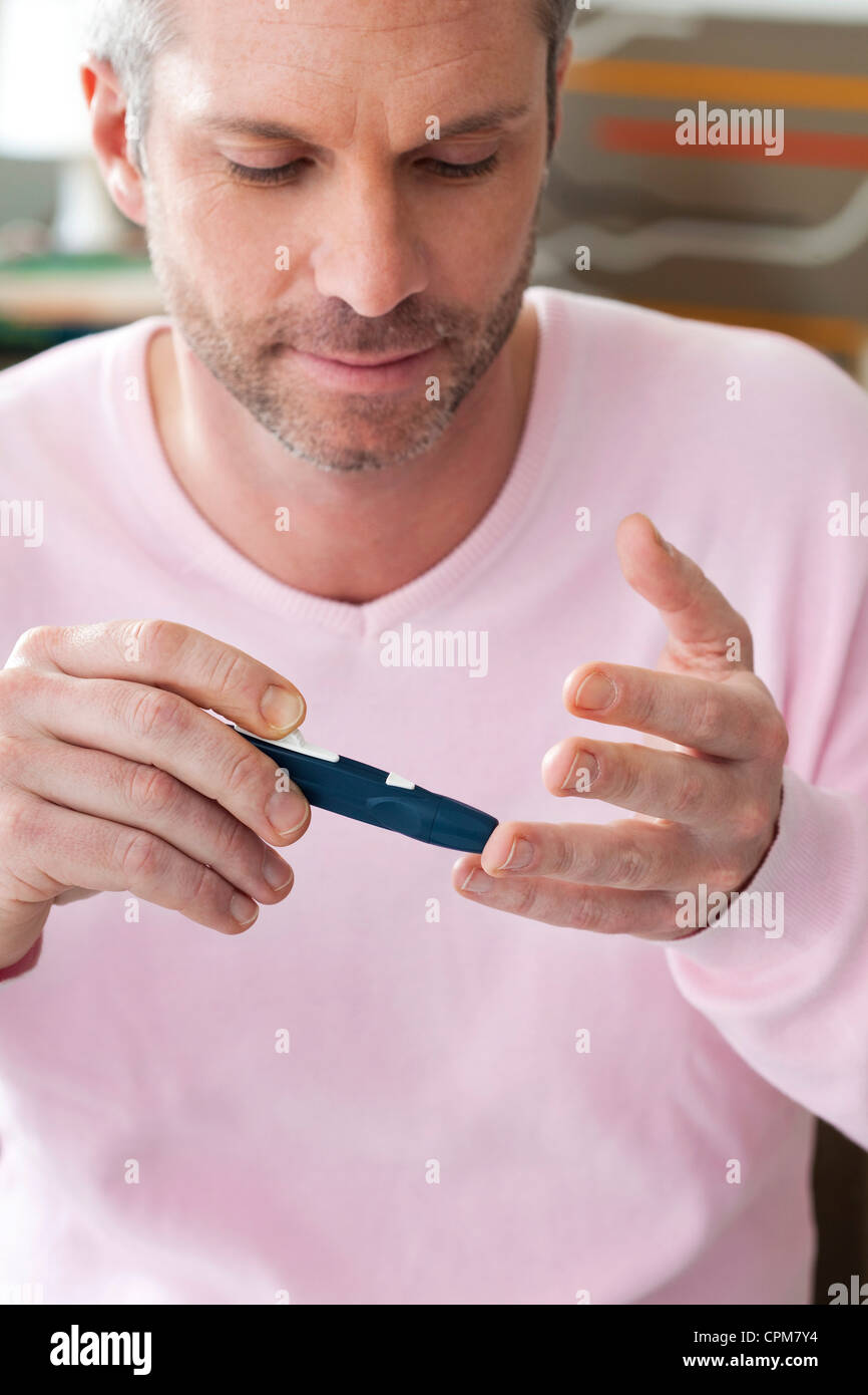 TEST FOR DIABETES, MAN Stock Photo - Alamy
