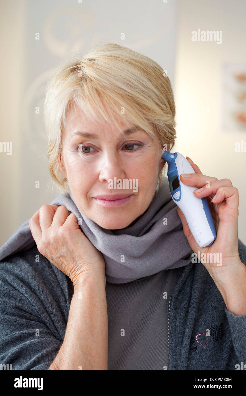 TEMPERATURE ELDERLY PERSON Stock Photo - Alamy