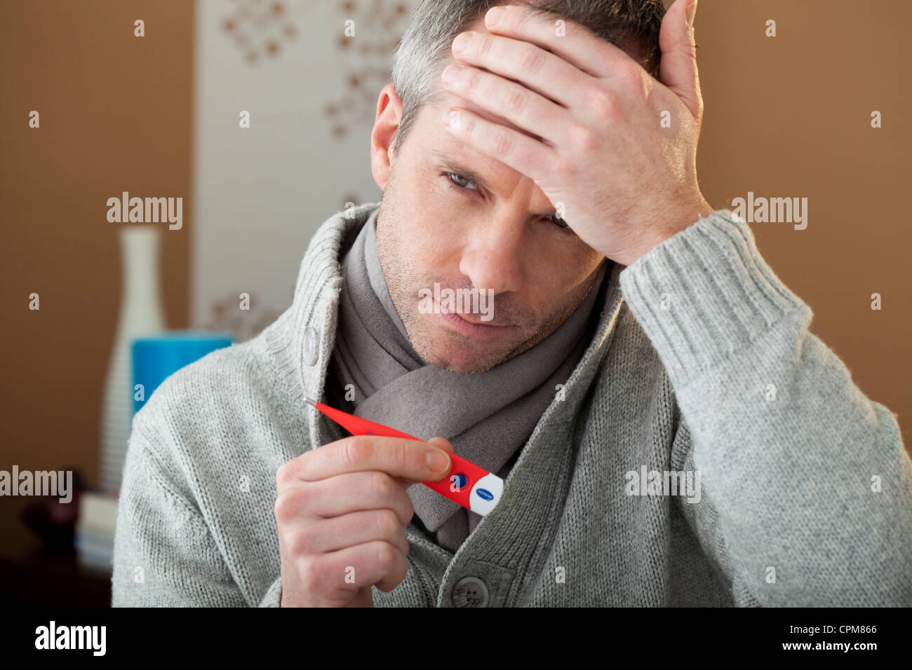 MAN WITH FEVER Stock Photo - Alamy