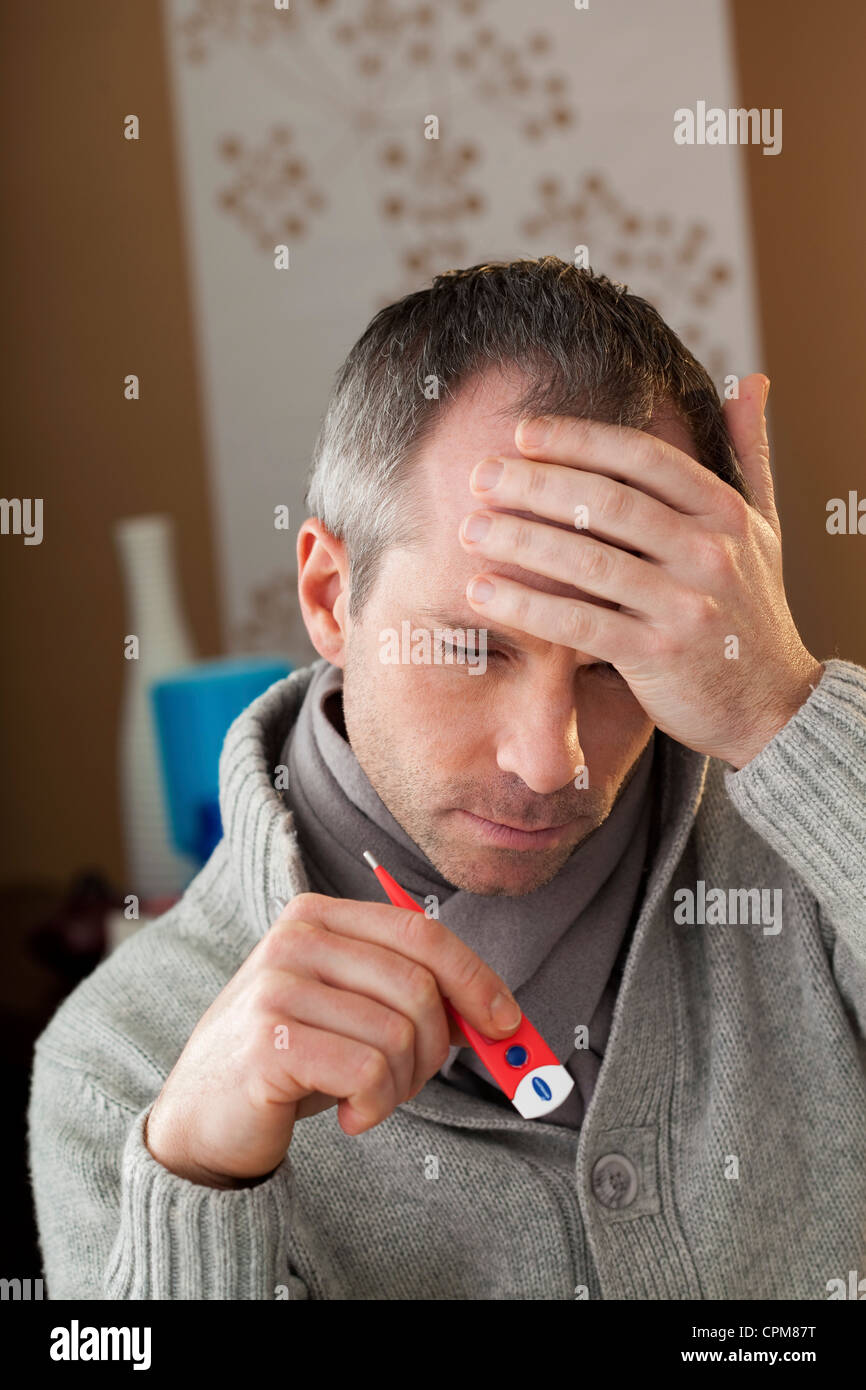MAN WITH FEVER Stock Photo - Alamy