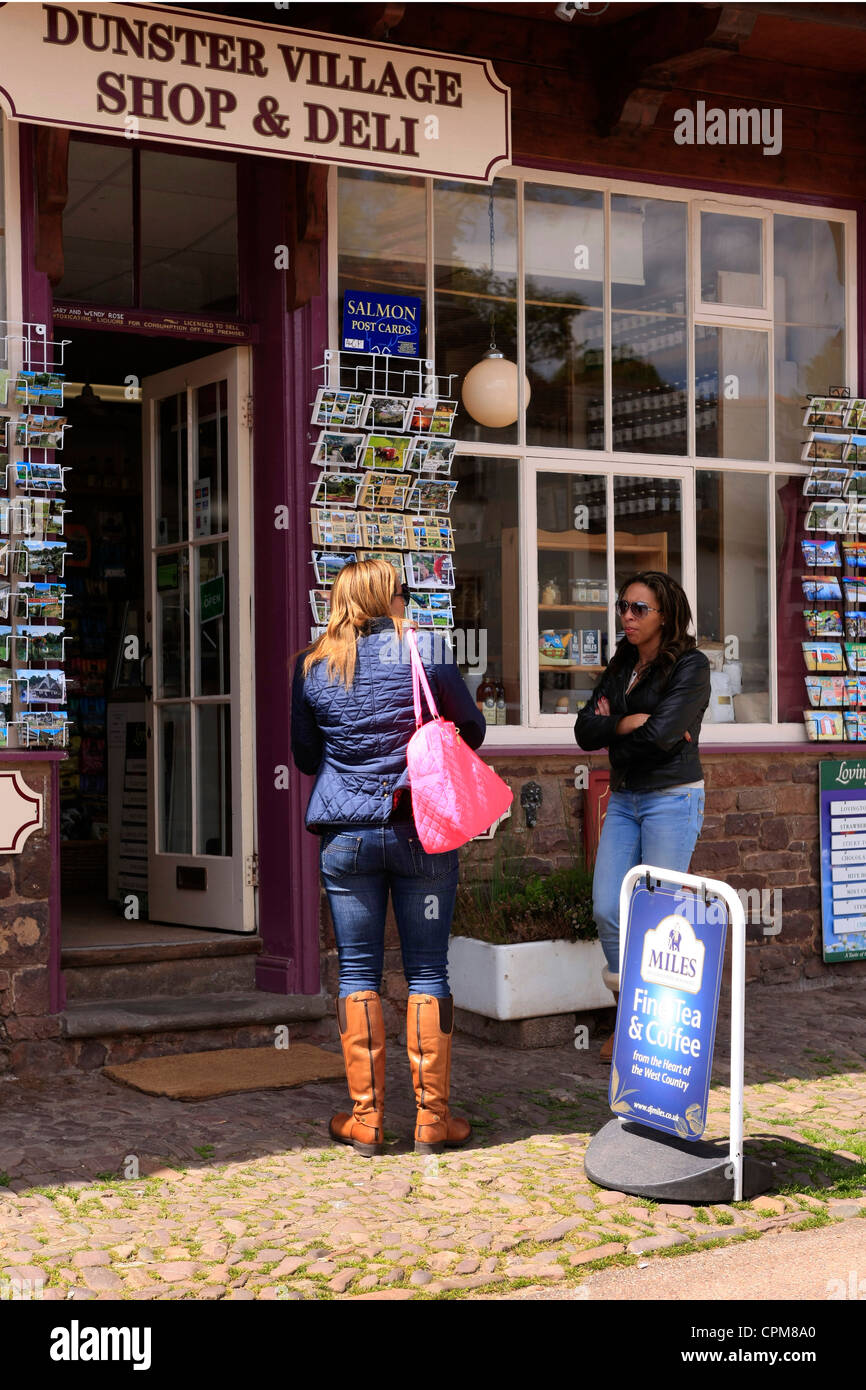 People outside the Dunster Village shop and Deli Stock Photo - Alamy