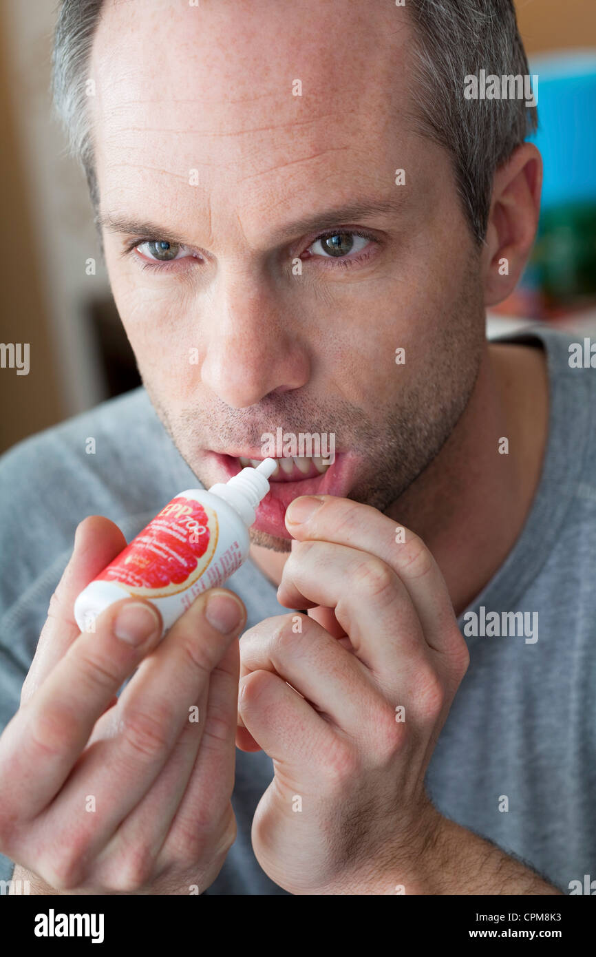 Mouth ulcers man hi-res stock photography and images - Alamy