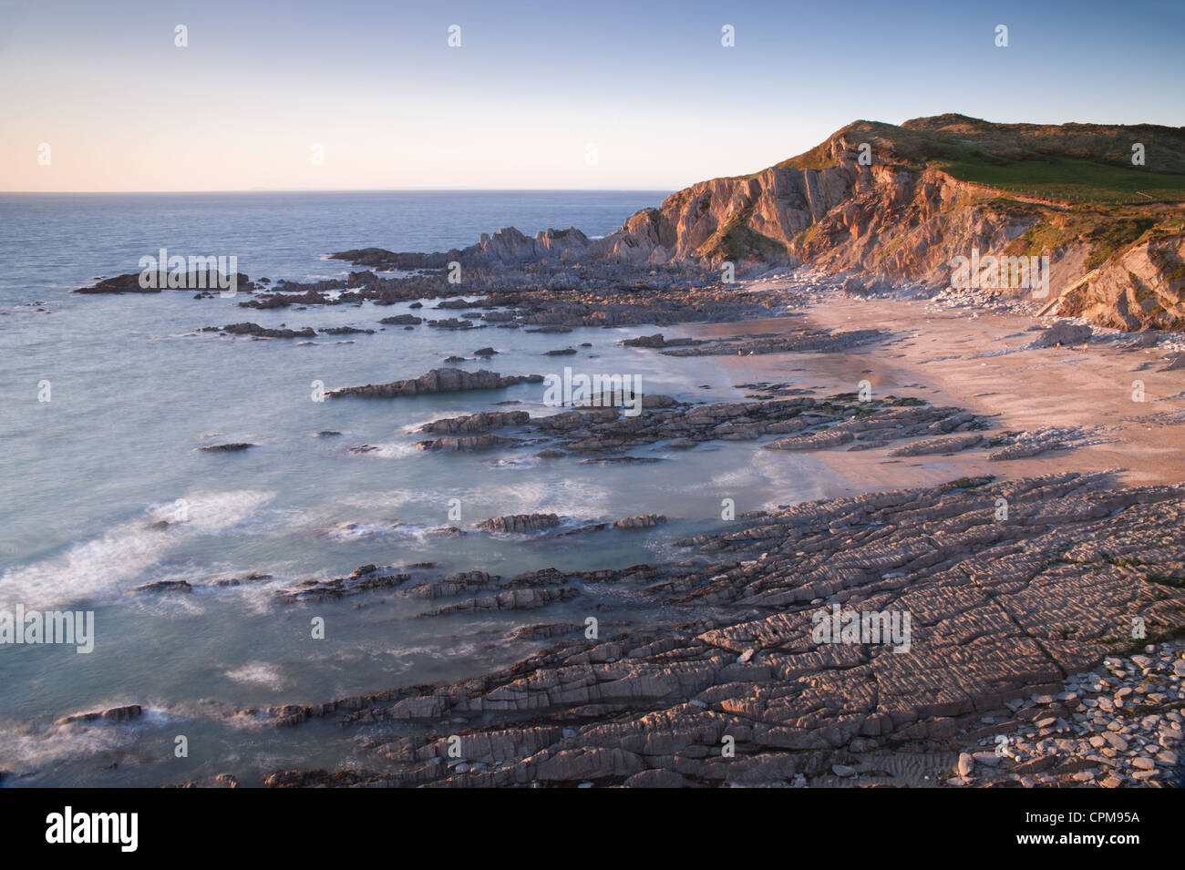 Evening, Rockham Bay, Devon Stock Photo - Alamy