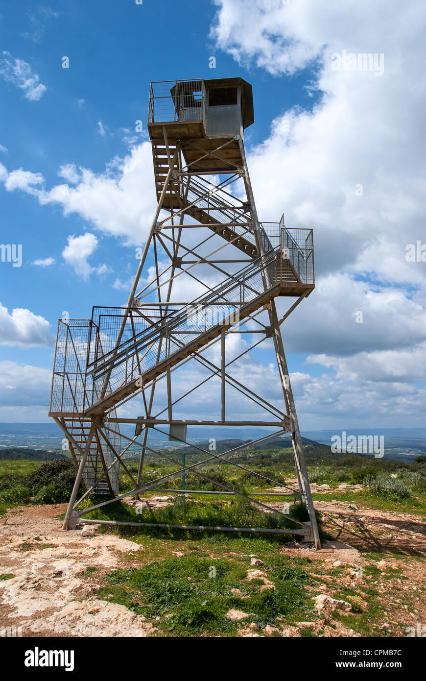 Observation military tower on the hill against the blue sky Stock Photo ...