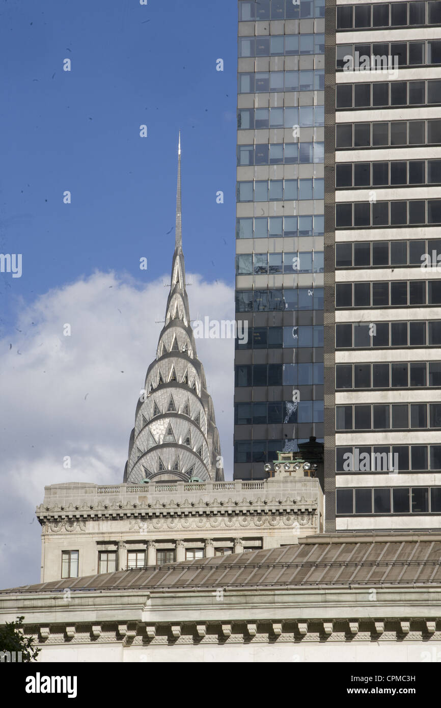 Spire of the Chrysler building pops up among the scrapers seen from ...