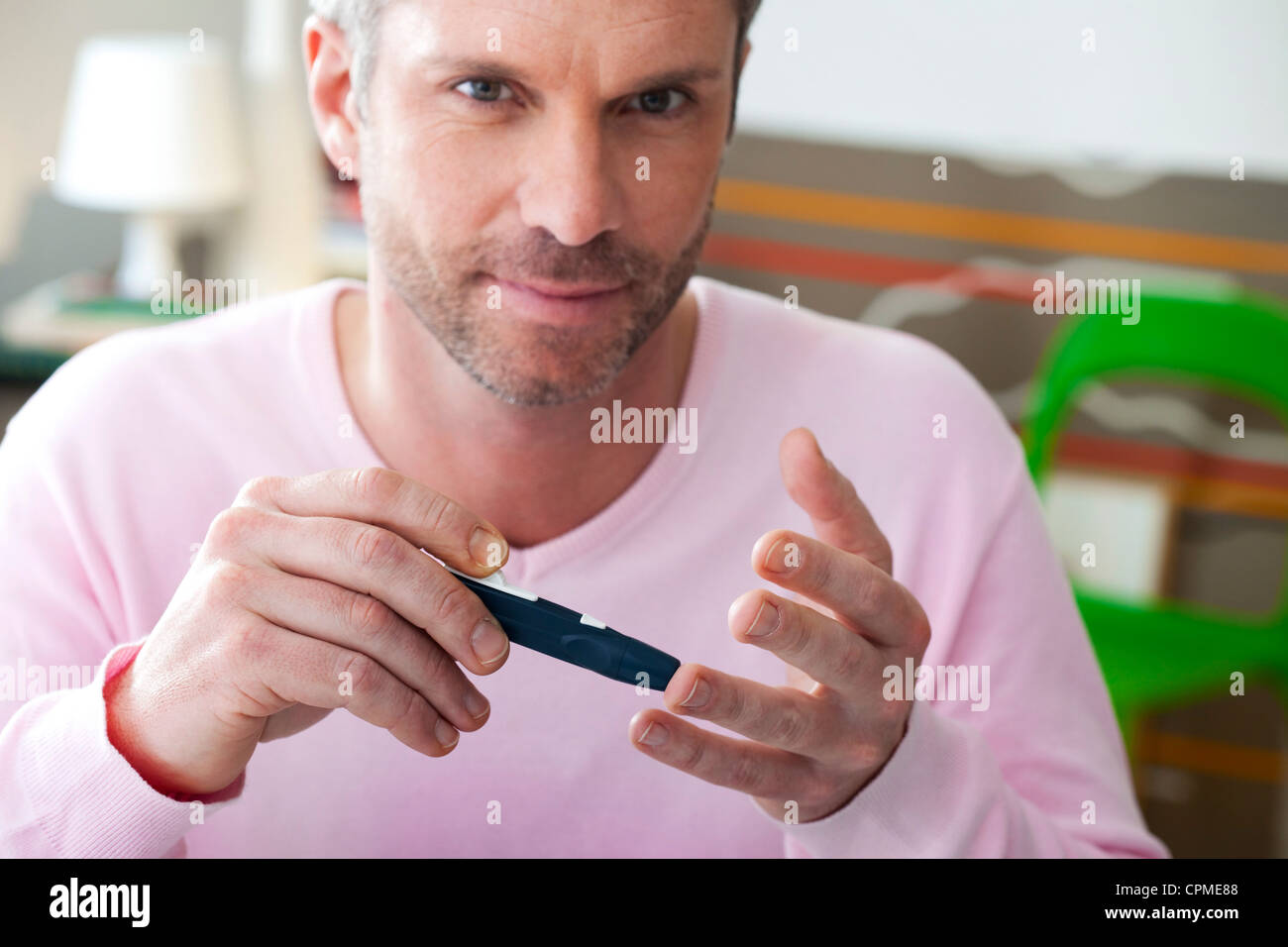 TEST FOR DIABETES, MAN Stock Photo - Alamy