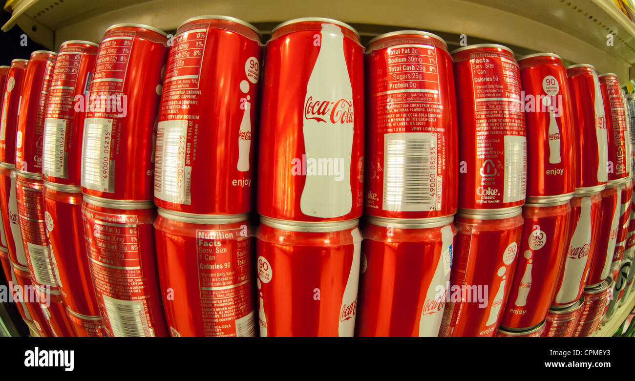 Six-packs of 7.5 ounce cans of Coca-Cola in a supermarket in New York ...