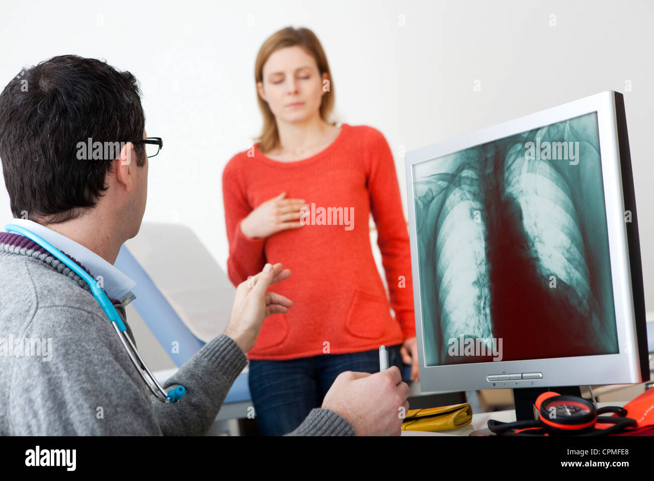 CARDIOLOGY CONSULTATION WOMAN Stock Photo - Alamy