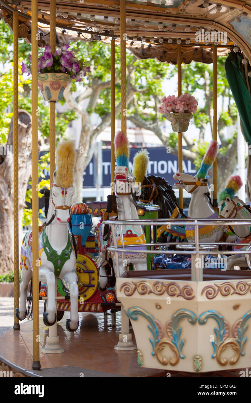 Fairground ride Cannes France Stock Photo - Alamy