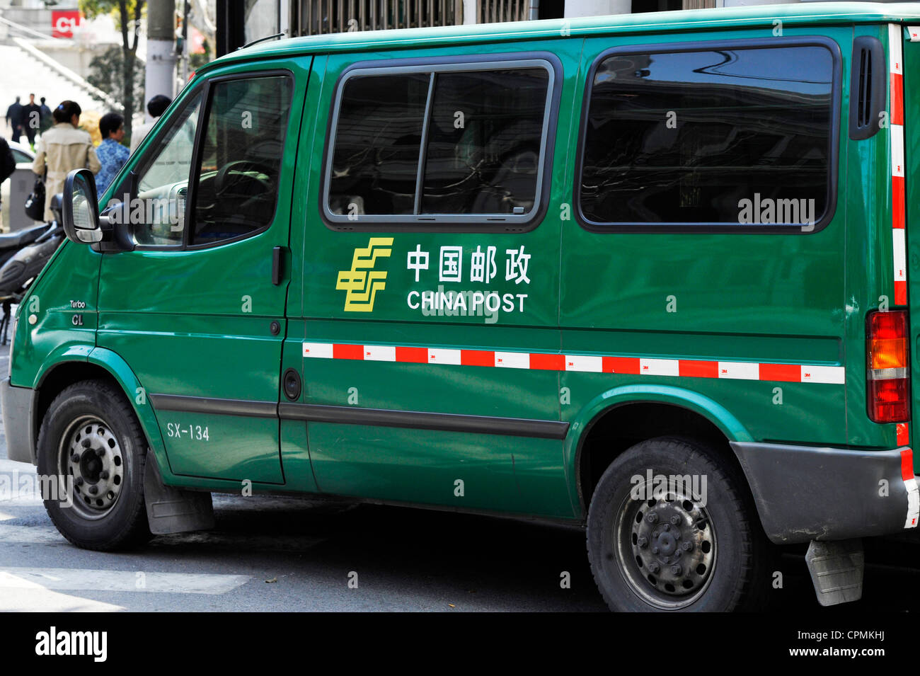 A China Post vehicle in Shanghai Stock Photo - Alamy