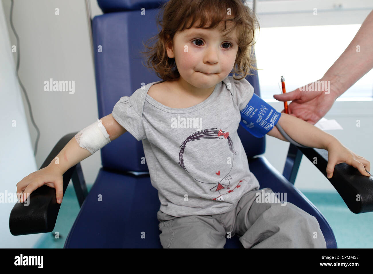 BLOOD PRESSURE, CHILD Stock Photo - Alamy