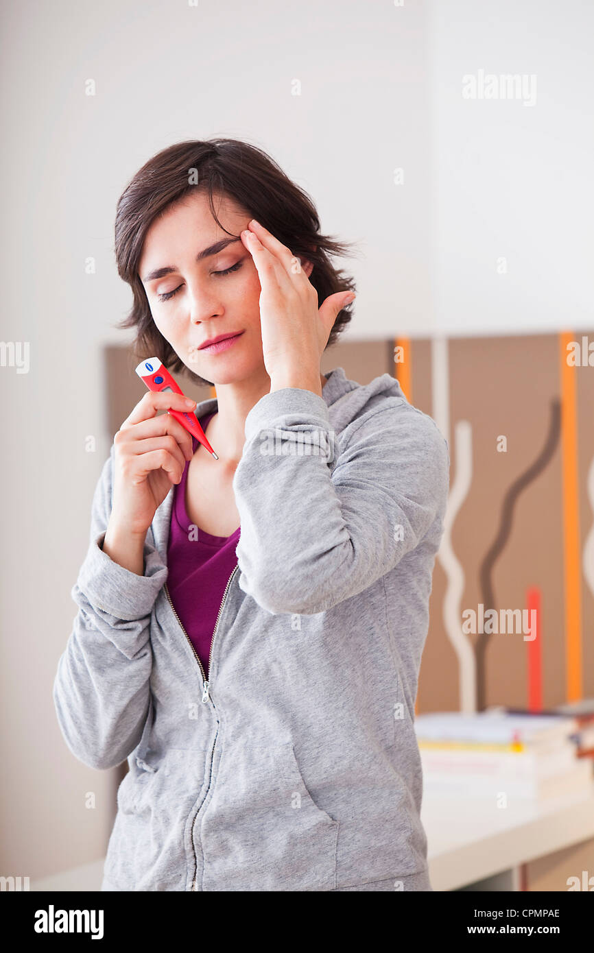 WOMAN WITH FEVER Stock Photo - Alamy