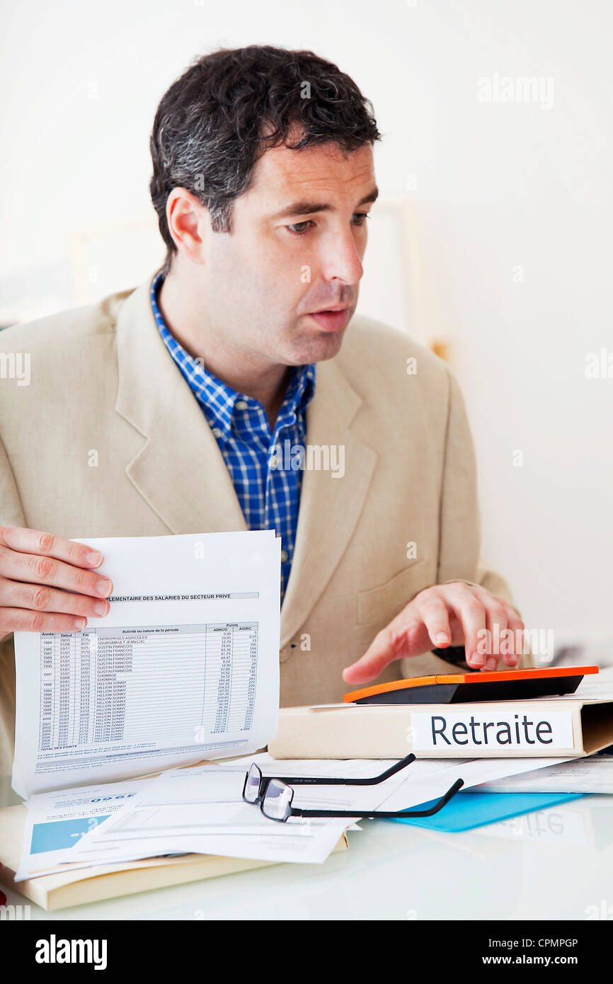 MAN FILLING OUT FORMS Stock Photo - Alamy