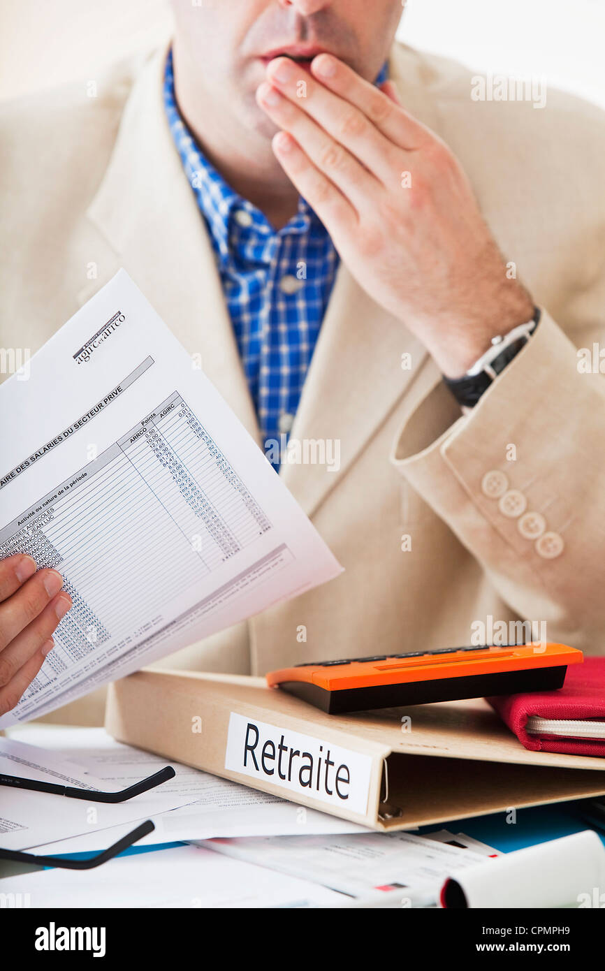 MAN FILLING OUT FORMS Stock Photo - Alamy