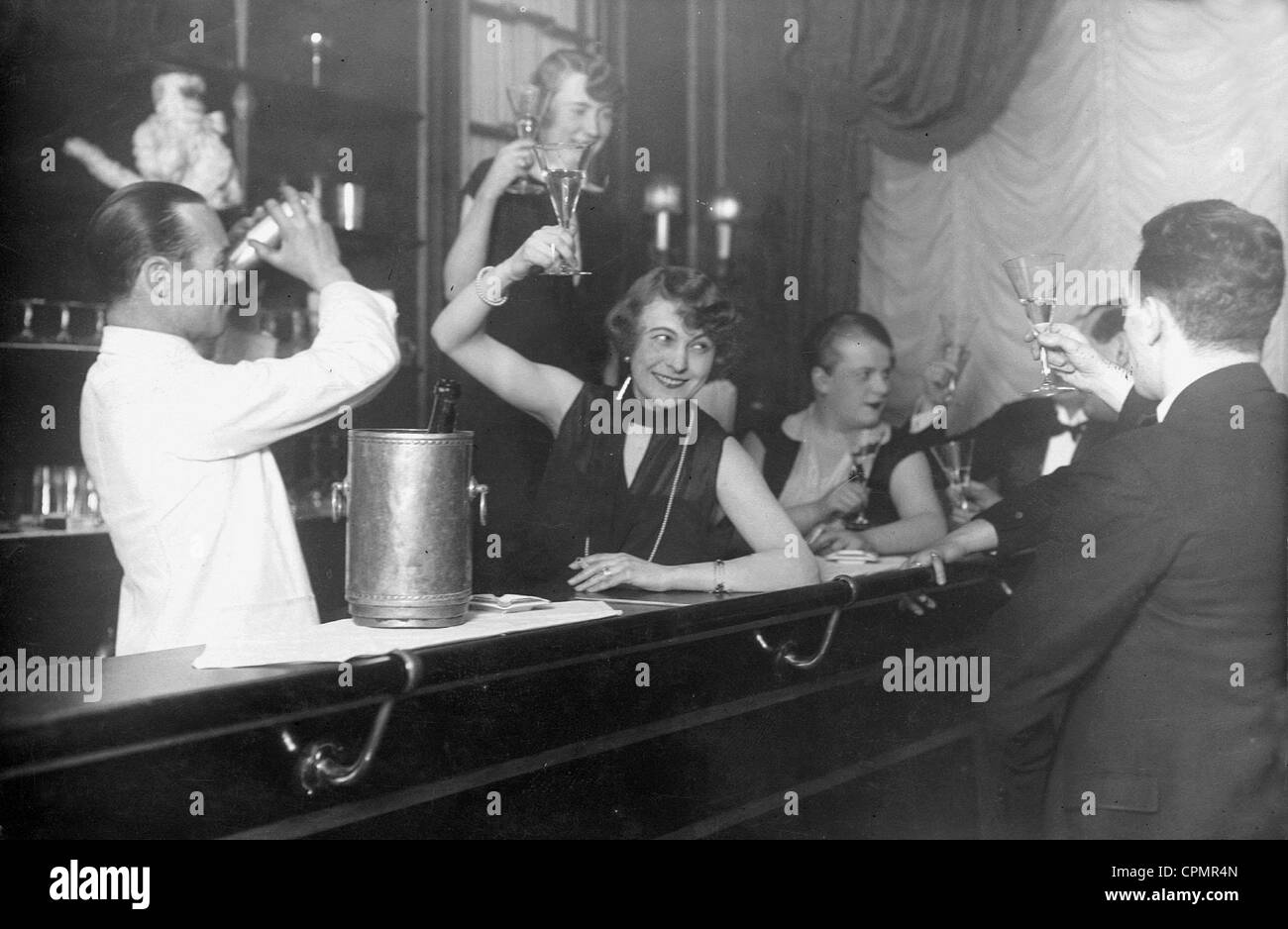 At a bar Black and White Stock Photos & Images - Alamy